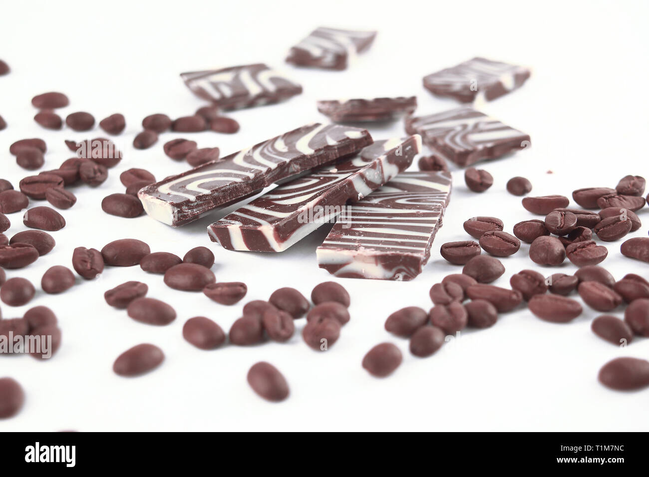 close up.set of chocolate bars and coffee beans. isolated on white ...