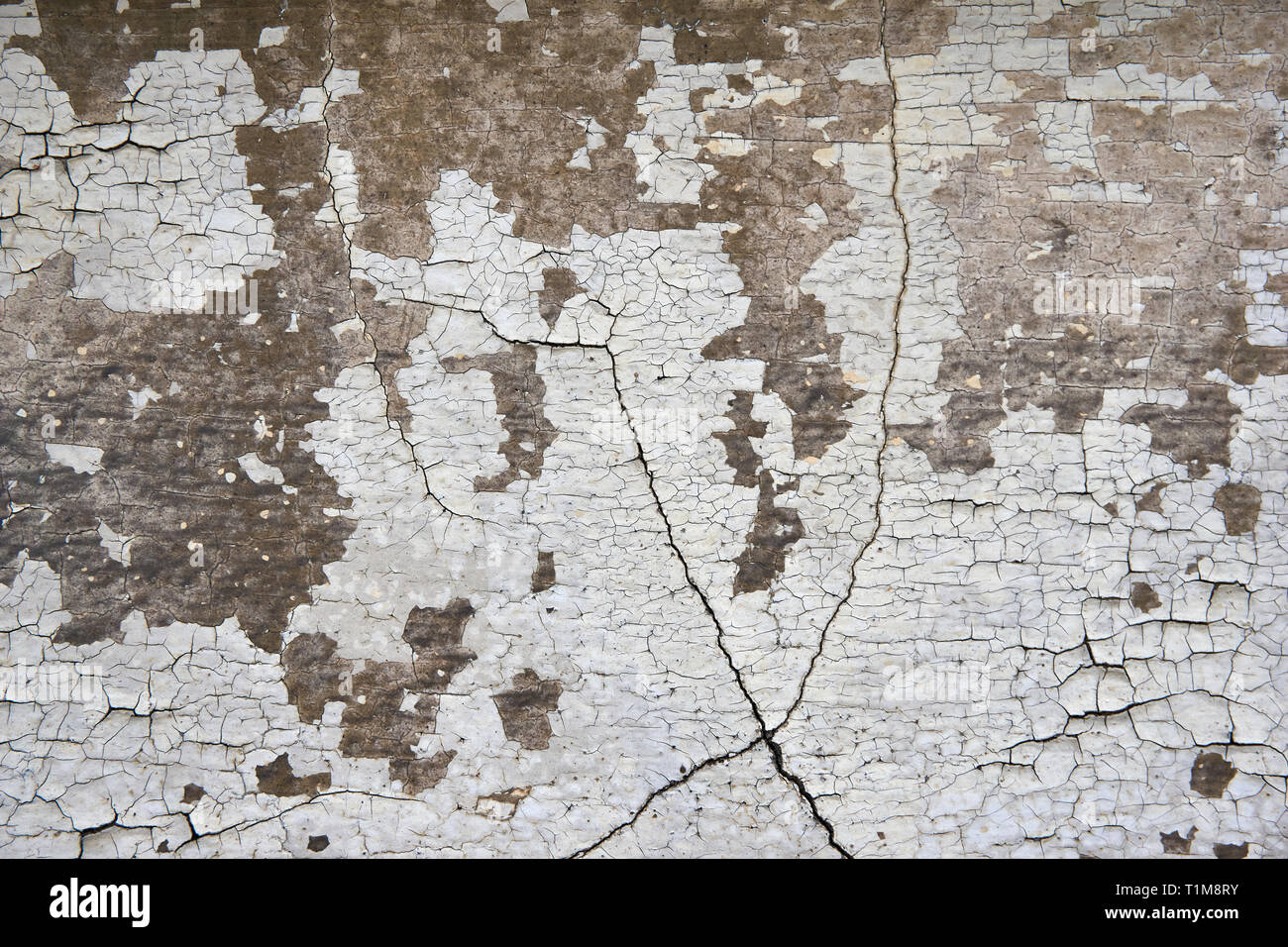 cracked color on a wall outside Stock Photo - Alamy