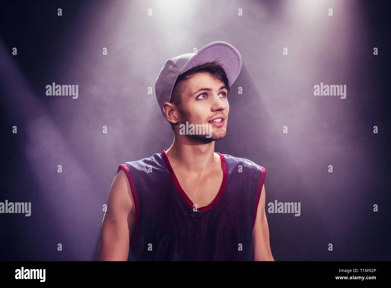 Male modern dancer on stage Stock Photo - Alamy