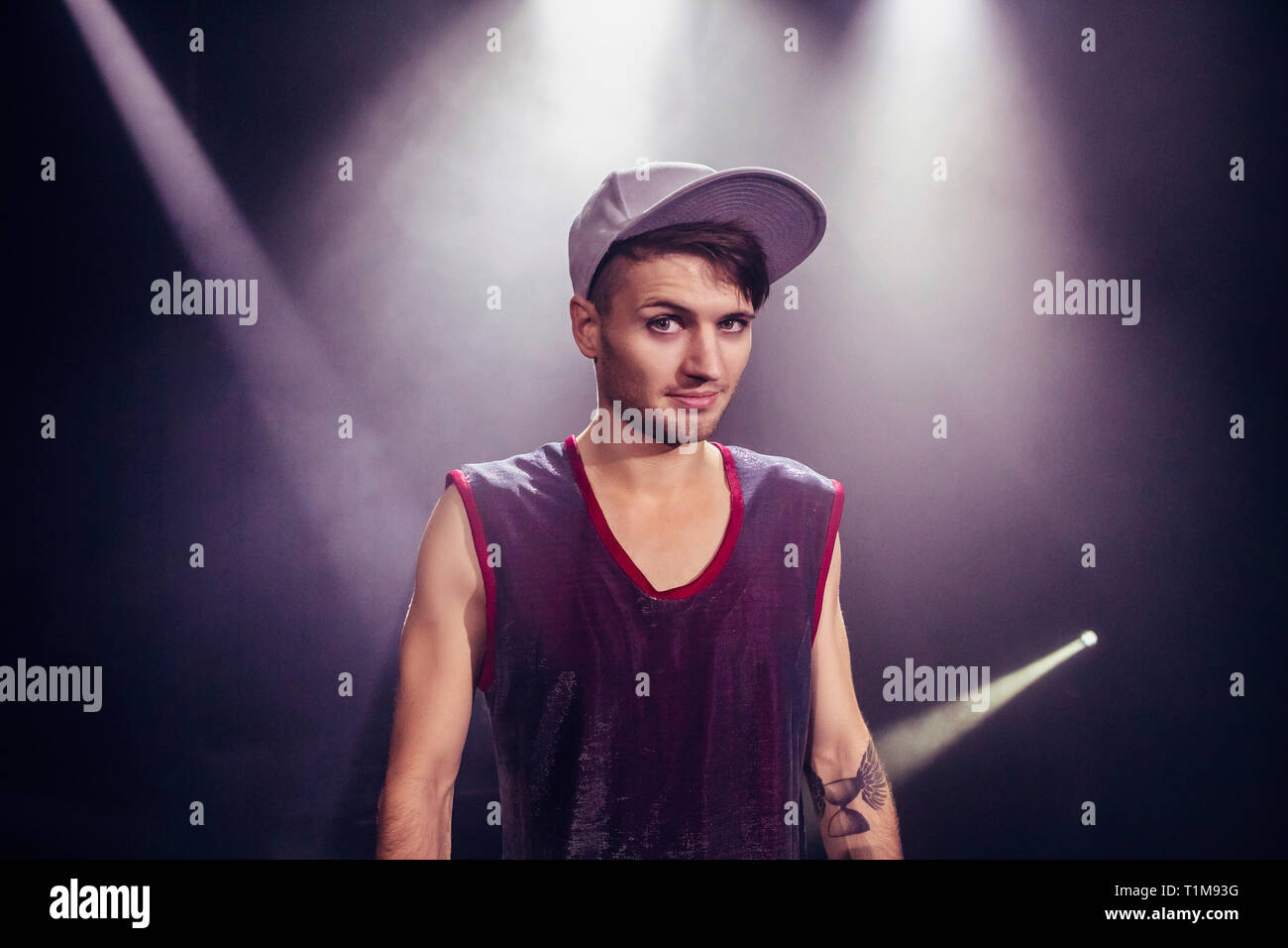 Portrait confident male dancer on stage Stock Photo - Alamy