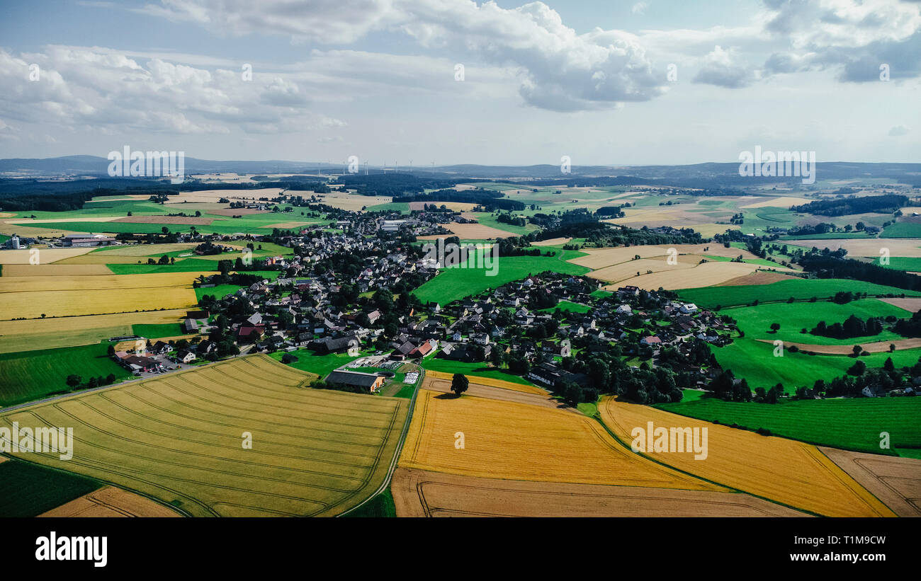 Drone point of view sunny view farmland and rural townscape, Bayern ...
