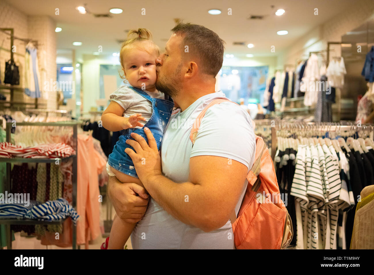 Father daughter in clothes shop hi-res stock photography and images - Alamy