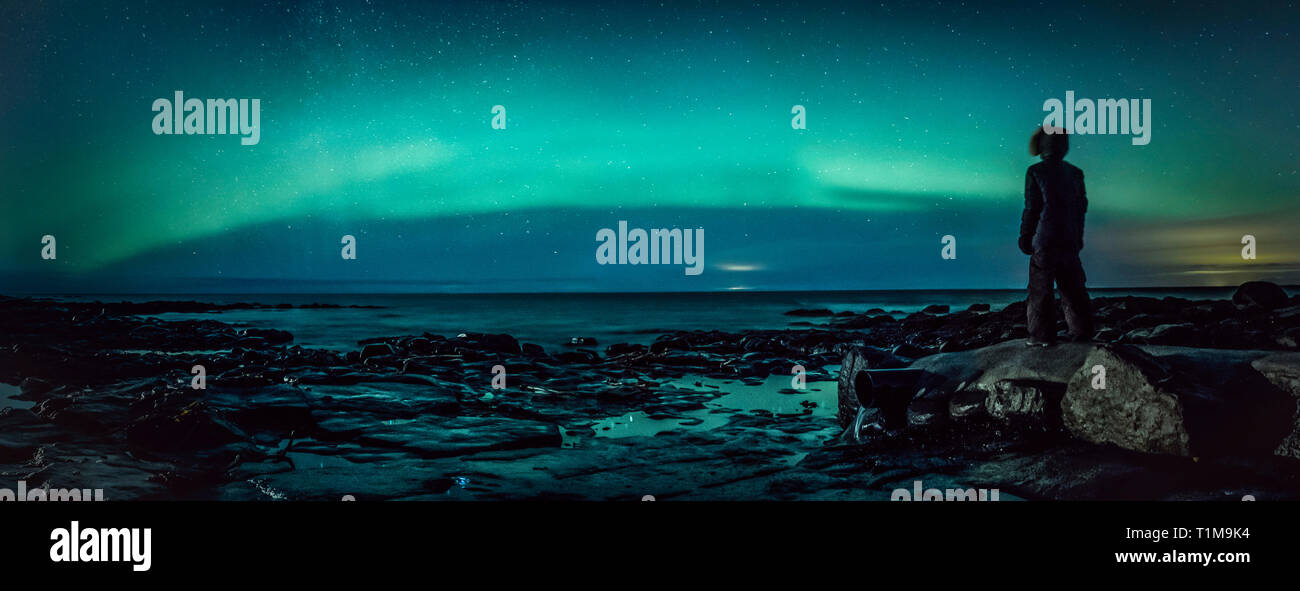Person under northern lights hi-res stock photography and images - Alamy