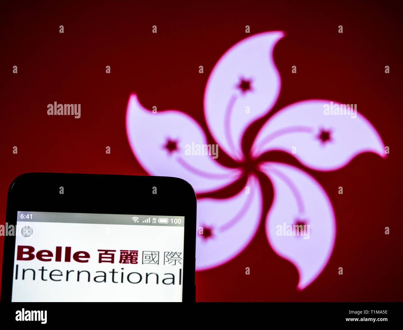 In this photo illustration a Belle International Holdings logo seen ...