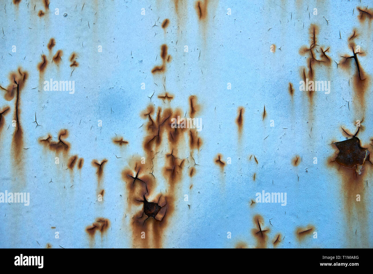 cracked color on a wall outside Stock Photo - Alamy