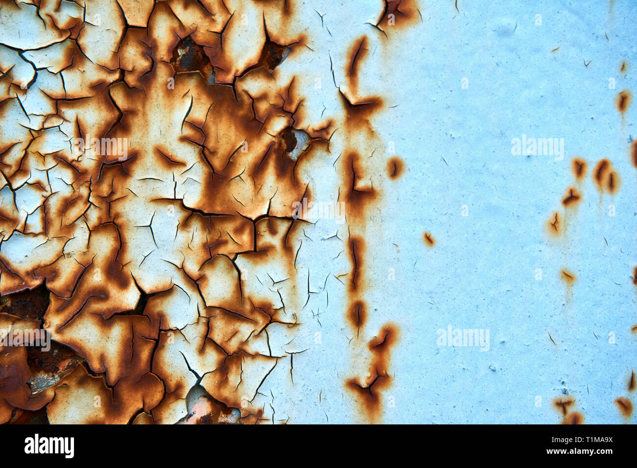 cracked color on a wall outside Stock Photo - Alamy
