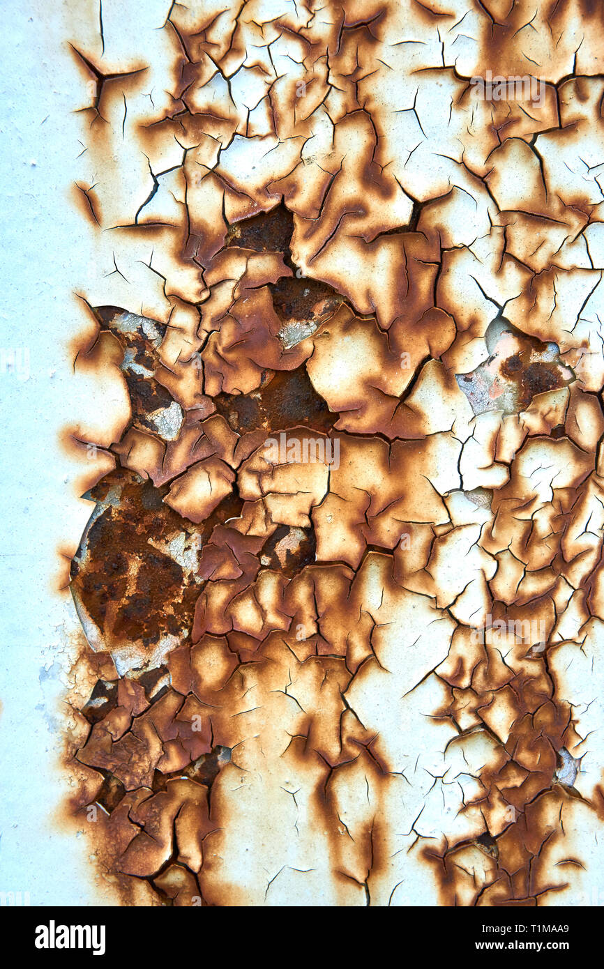 cracked color on a wall outside Stock Photo - Alamy