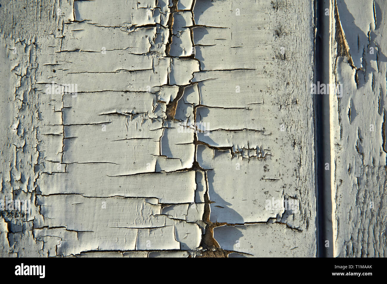 cracked color on a wall outside Stock Photo - Alamy