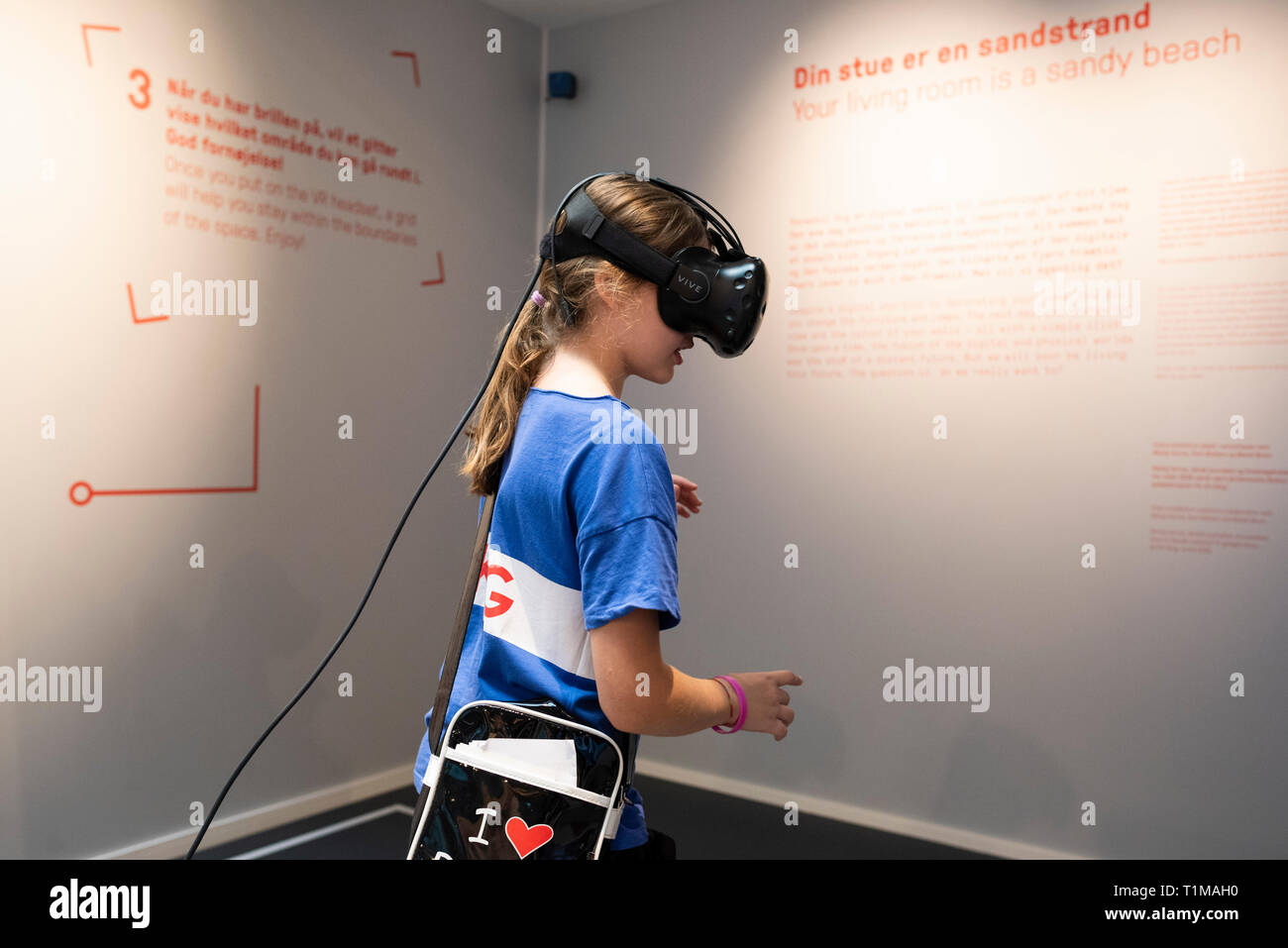 Copenhagen. Denmark. Child using a VR (virtual reality) headset to ...