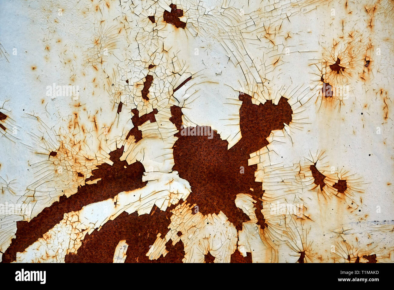 cracked color on a wall outside Stock Photo - Alamy