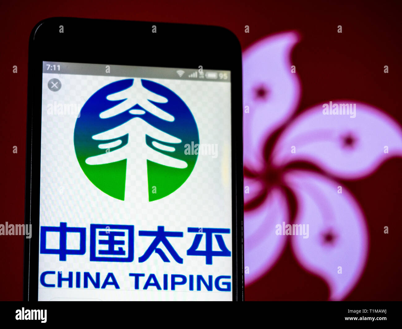 In this photo illustration a China Taiping Insurance Holdings logo seen ...