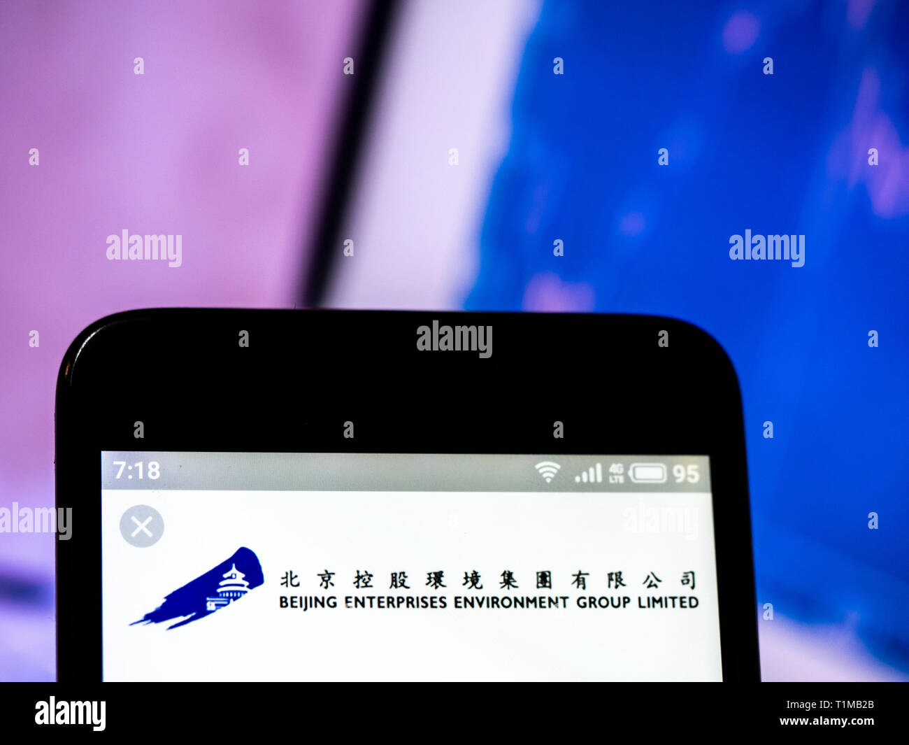 In this photo illustration a Beijing Enterprises Holdings logo seen ...