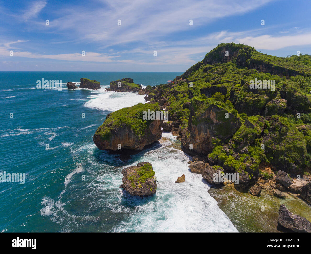 Scattered rock of ancient volcano of Latak (Gunung Purba of Latak) in ...