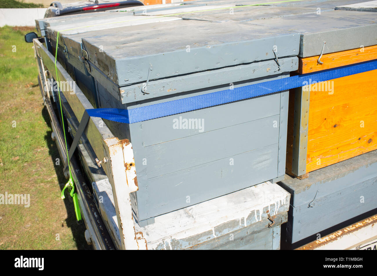 Trailer load with wooden hives ready to move. Beekeepers periodically ...