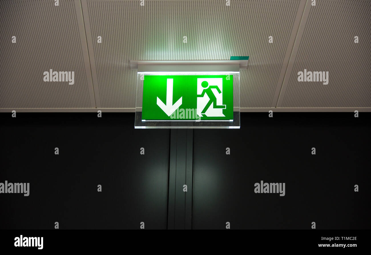 Exit sign hanging on ceiling hi-res stock photography and images - Alamy