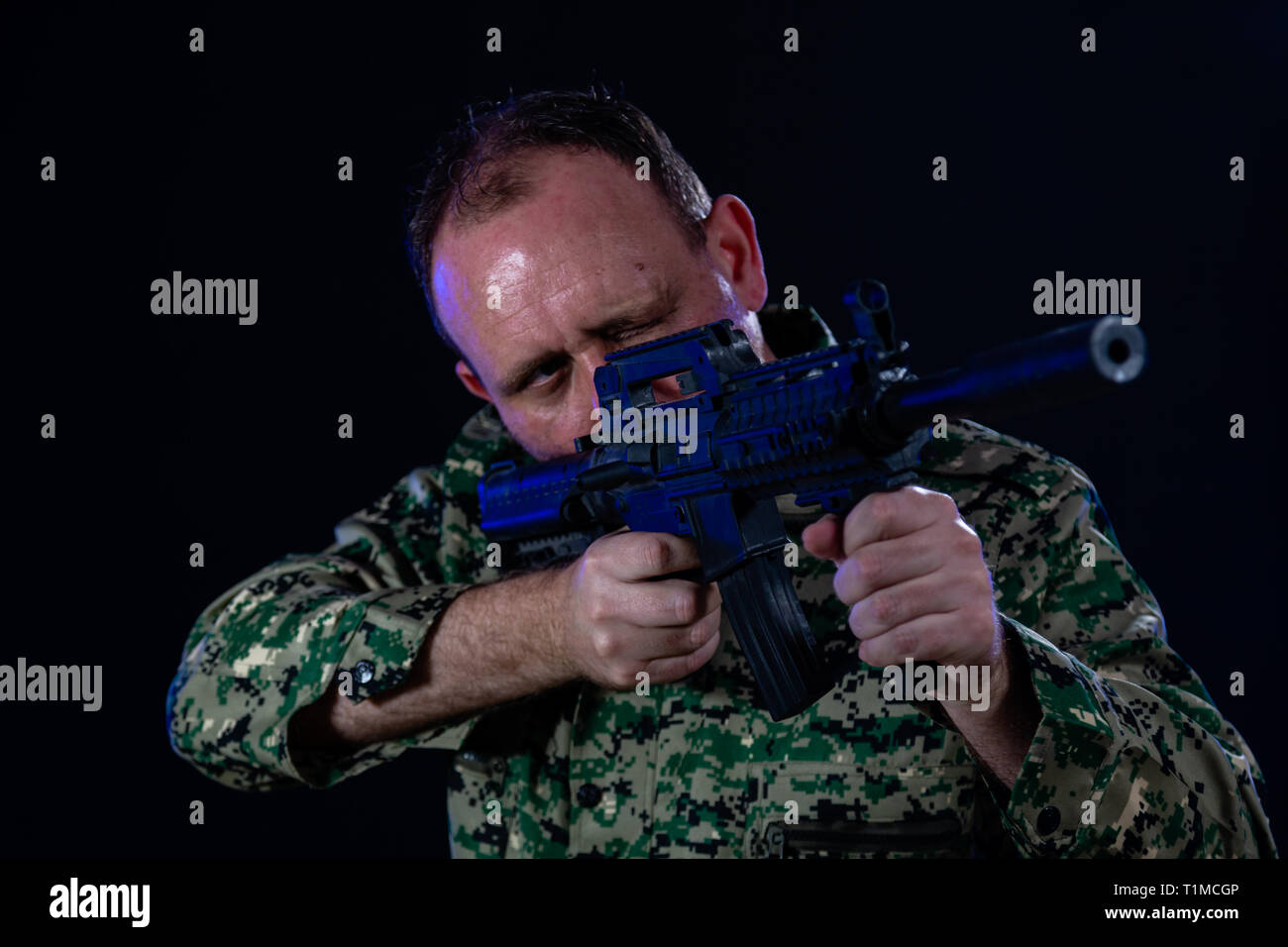 Combat fatigues hi-res stock photography and images - Alamy