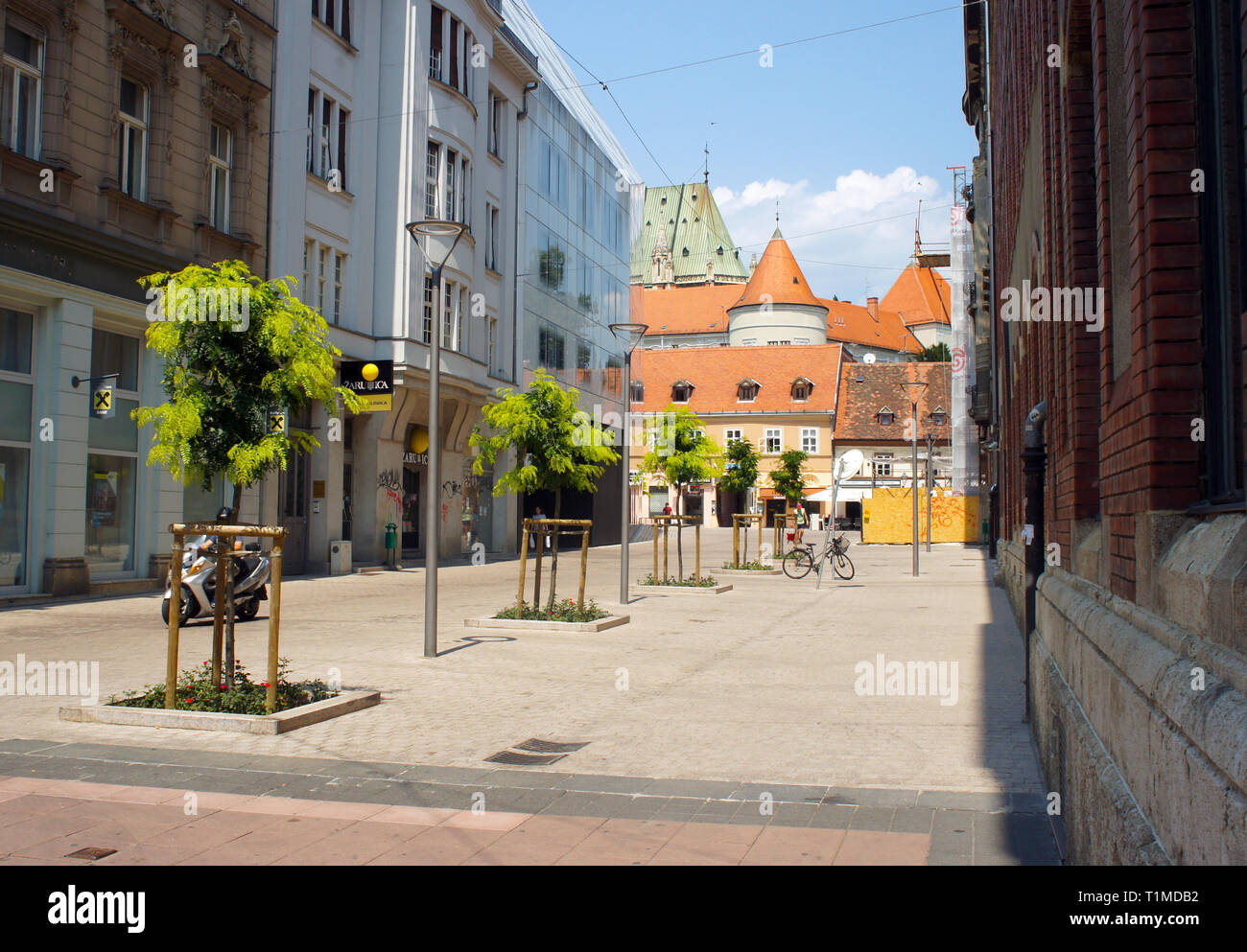View of old town street, sunny day Stock Photo - Alamy