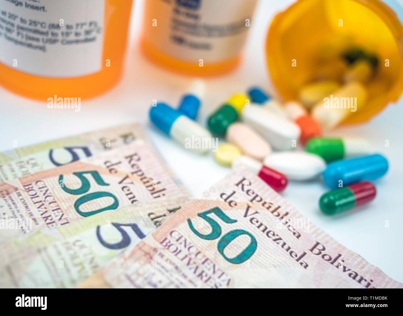 Medicines next to banknotes of Venezuela, shady deal of medication in ...