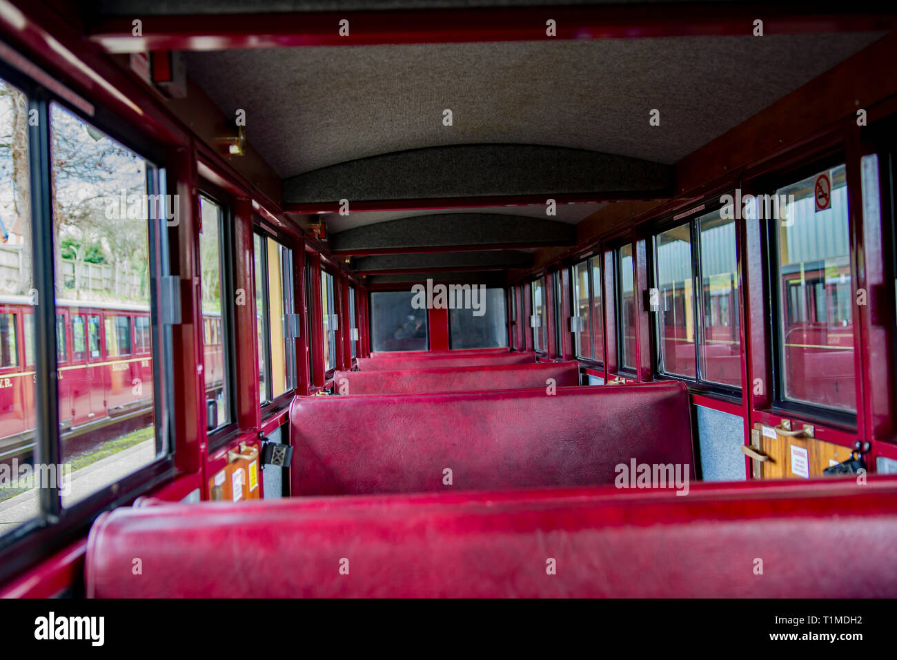 The inside of a passenger carriage pulled by steam trains on the Bure ...