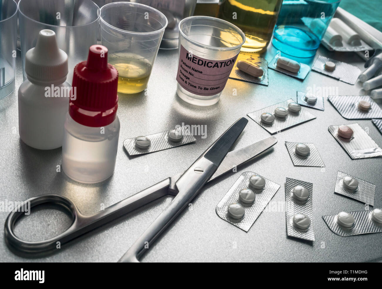 Different dosage medication in hospital, conceptual image Stock Photo ...
