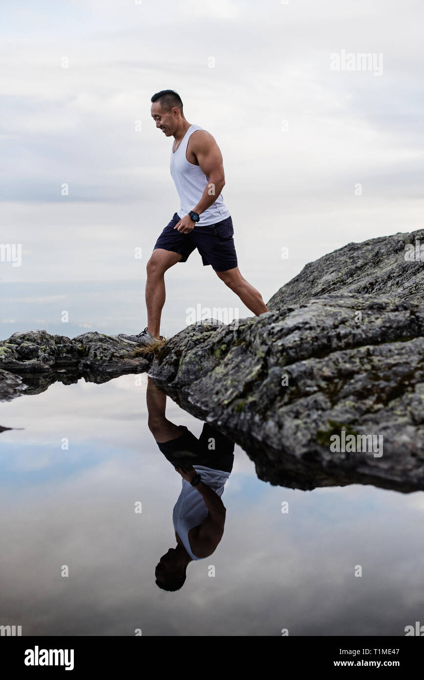 Adult walking down rocks hi-res stock photography and images - Alamy