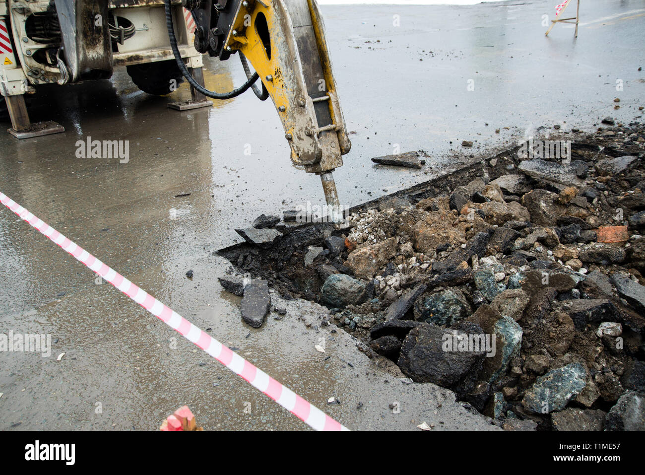 Repair of communications located under the carriageway. Road repair car ...