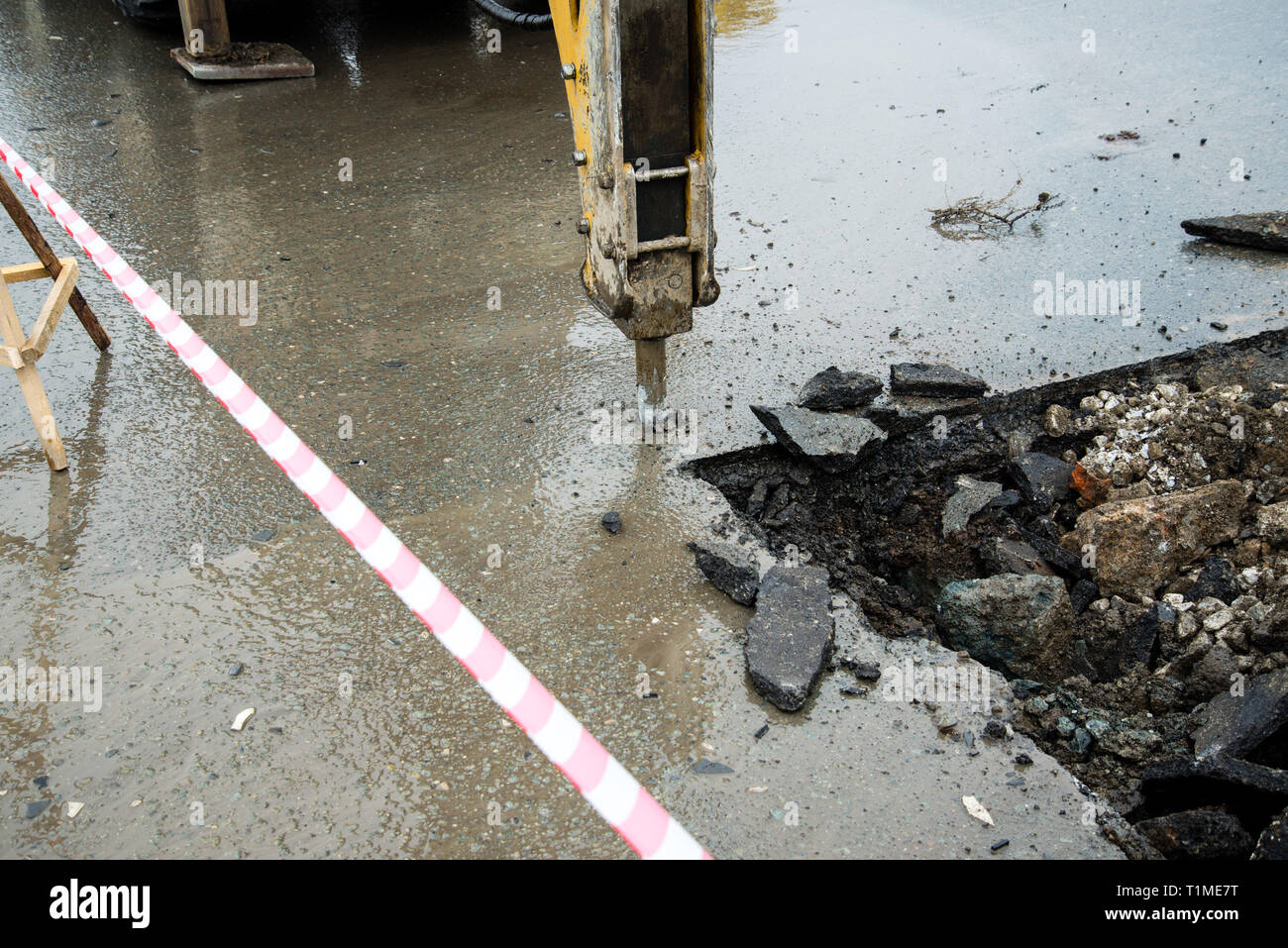 Repair of communications located under the carriageway. Road repair car ...