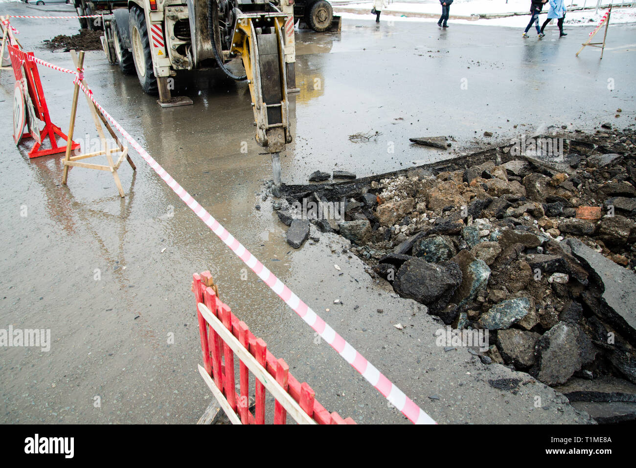 Repair of communications located under the carriageway. Road repair car ...