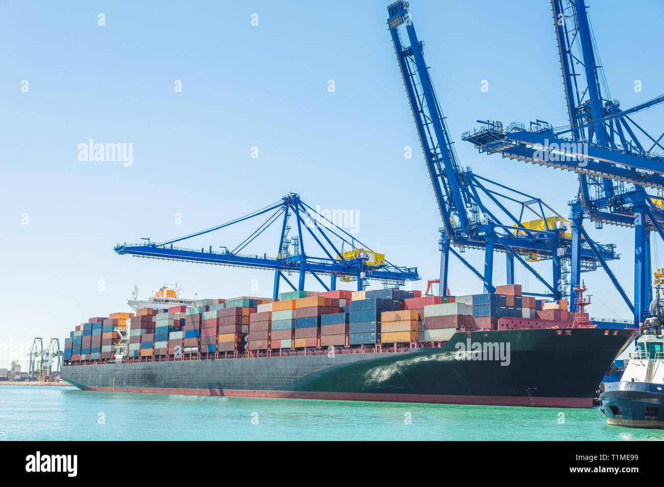 Container ship in harbor Stock Photo - Alamy