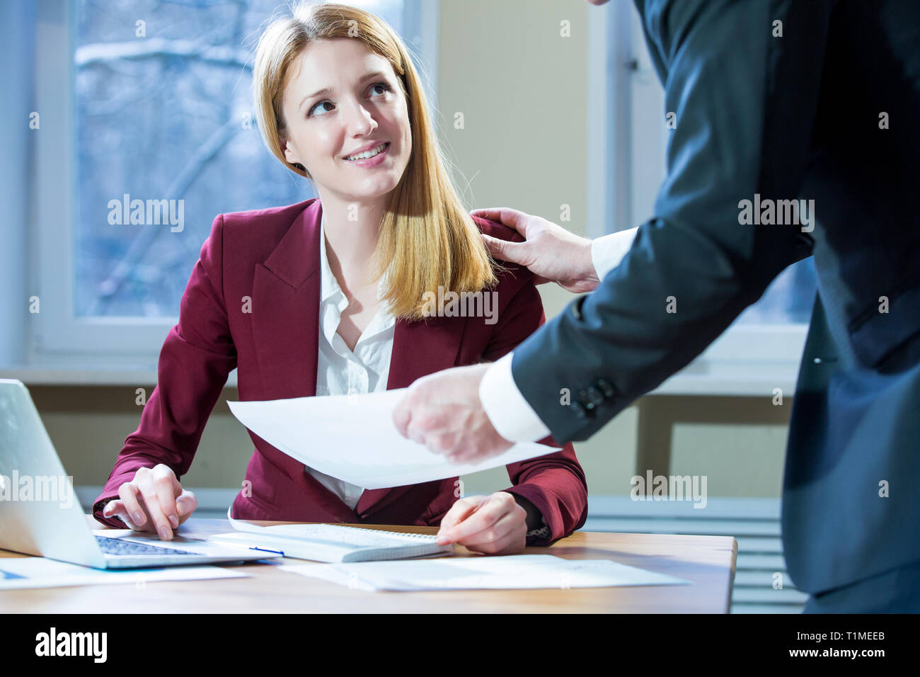 Business partners discussing documents and ideas at meeting. Man and ...
