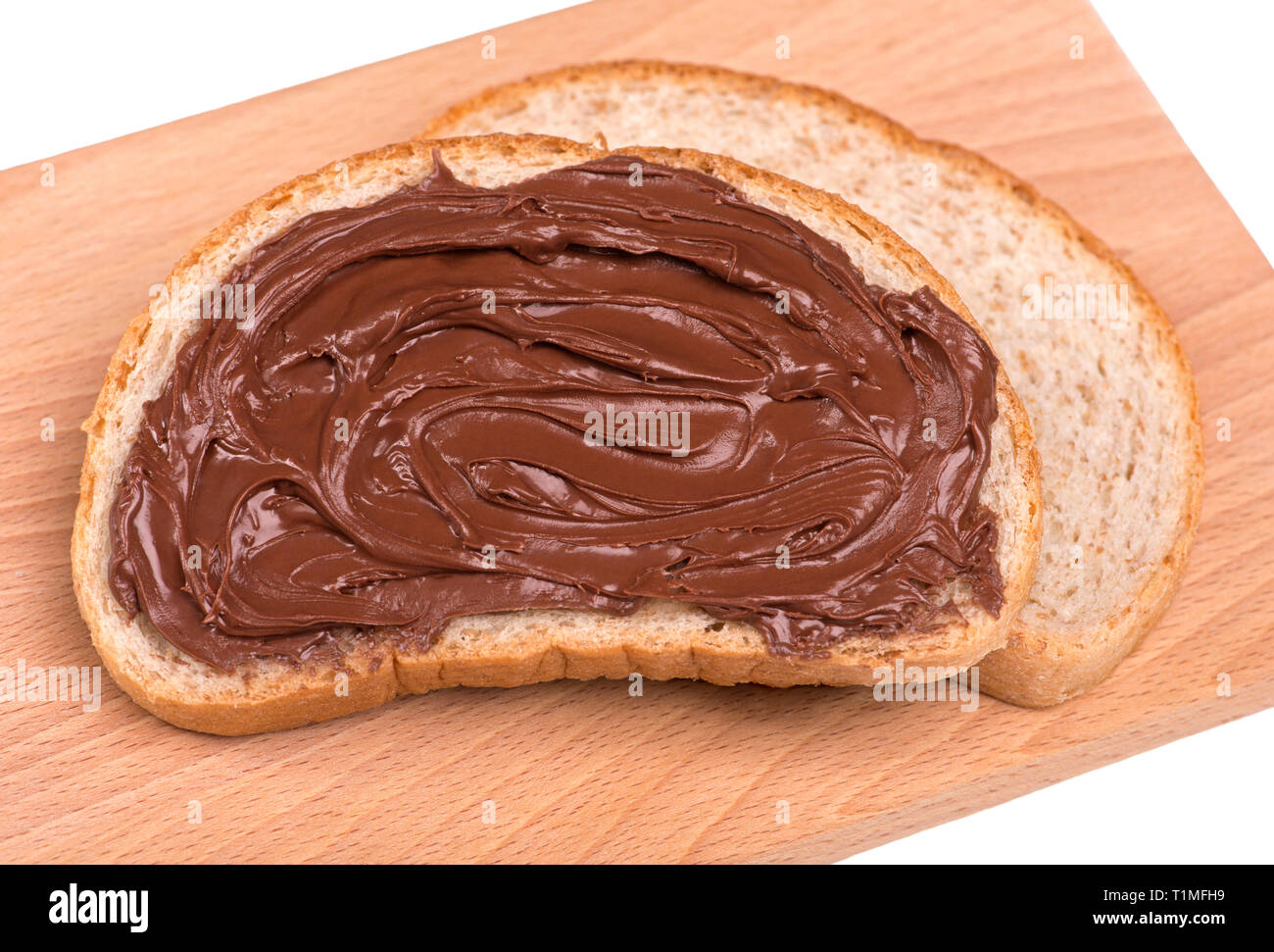 Slices of bread spread with molten chocolate Stock Photo - Alamy