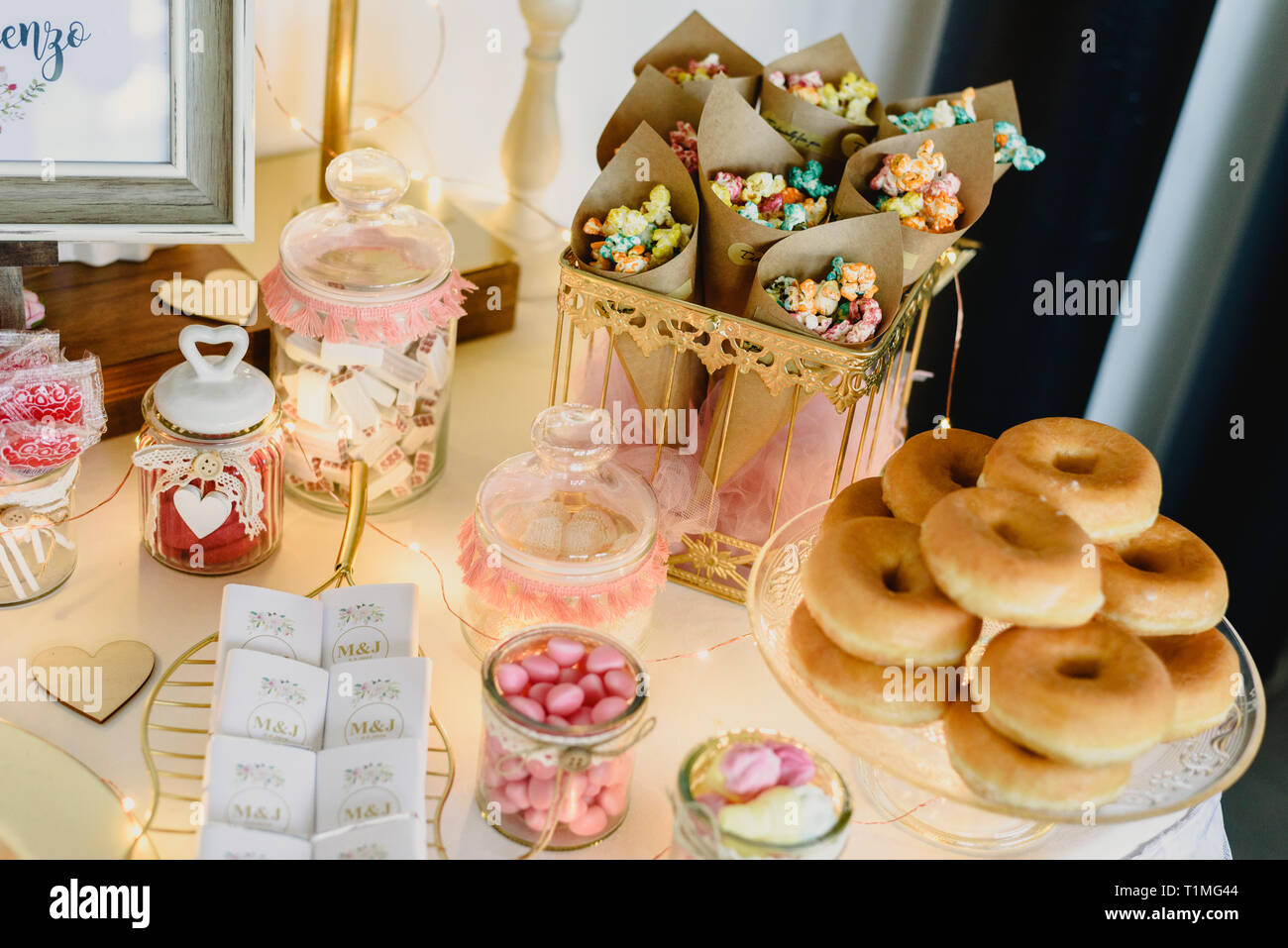 Candy bar beautifully decorated with sweets in a vintage event Stock ...