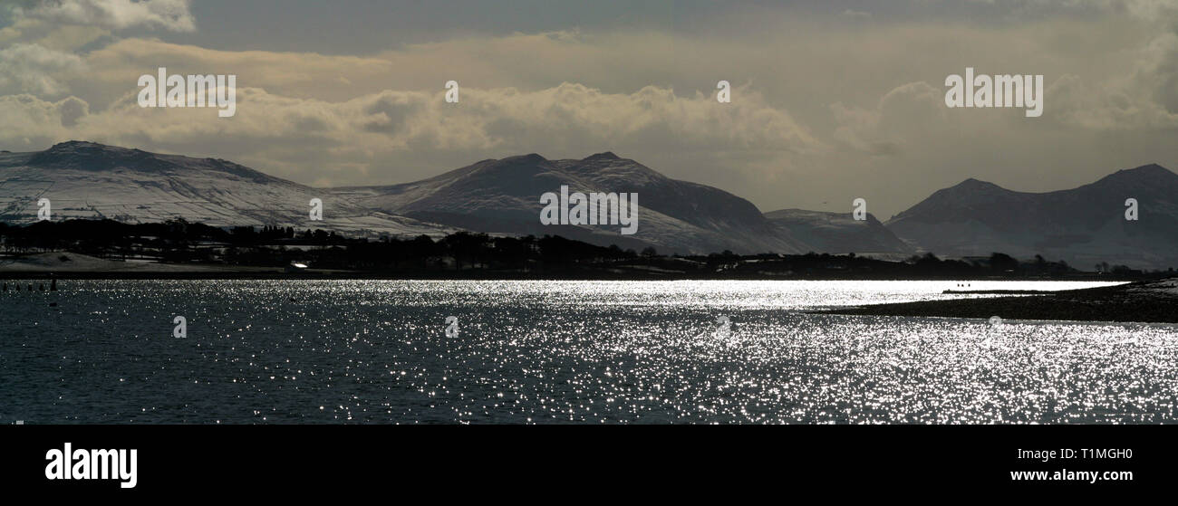 Looking south from the village of Brynsiencyn on Anglesey along the ...