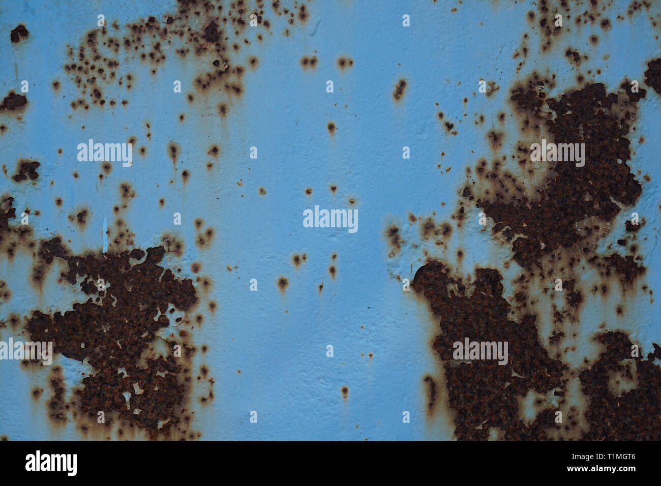 Blue background - rusty container Stock Photo - Alamy