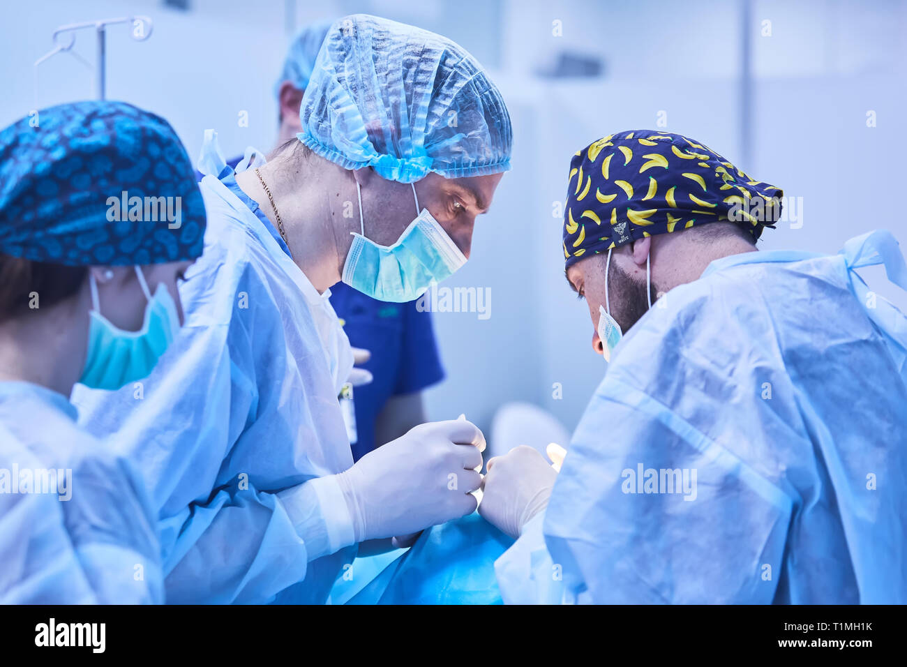 Serious surgeons during operation hi-res stock photography and images ...