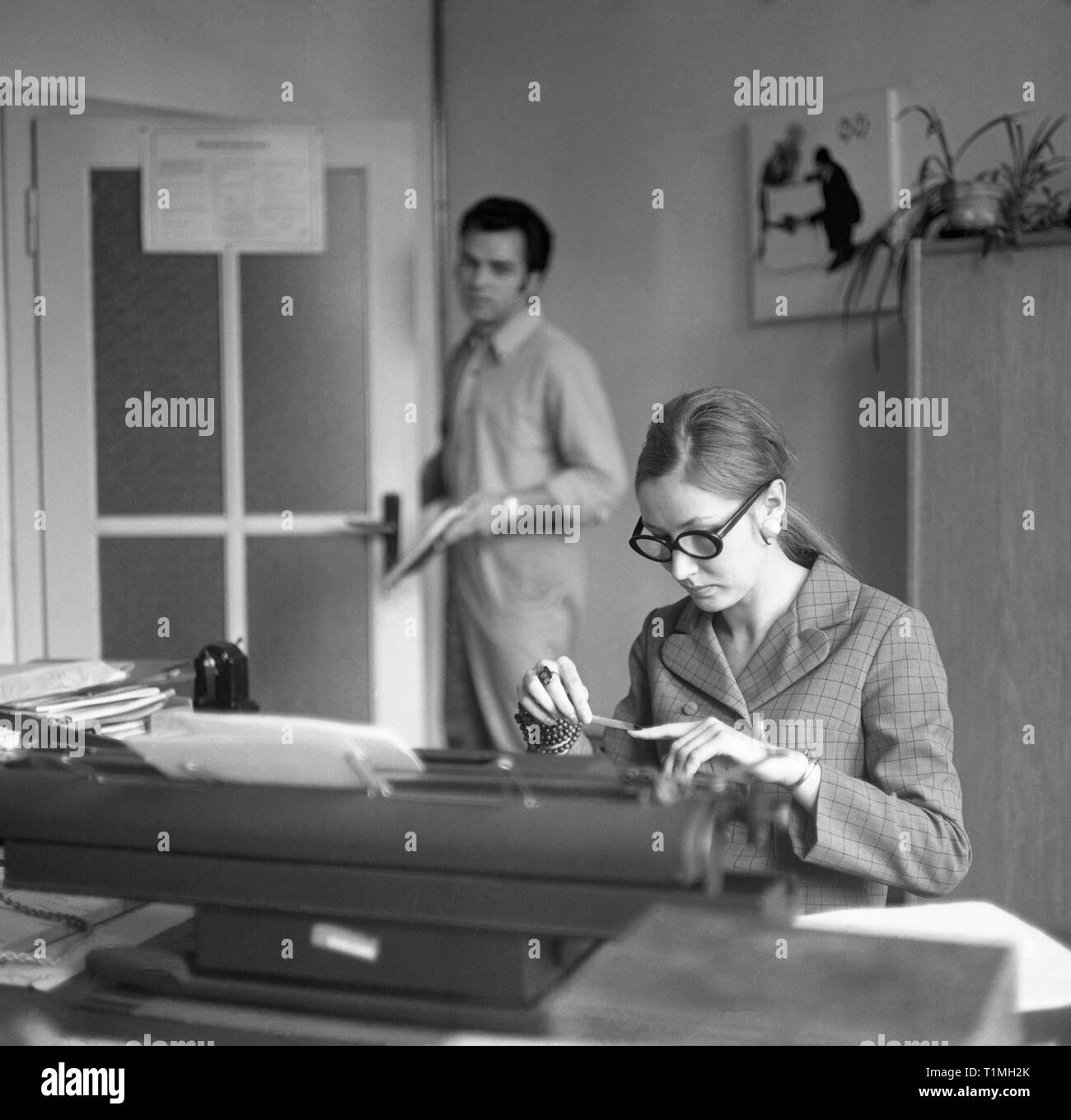 09.08.1968, Berlin, Berlin, GDR - Secretary is observed filing her ...