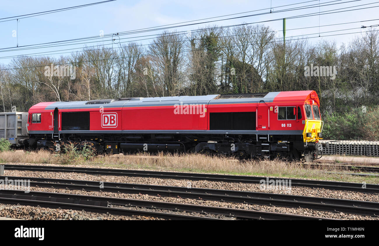 DB Class 66 diesel locomotive with freight in sidings at Hitchin ...