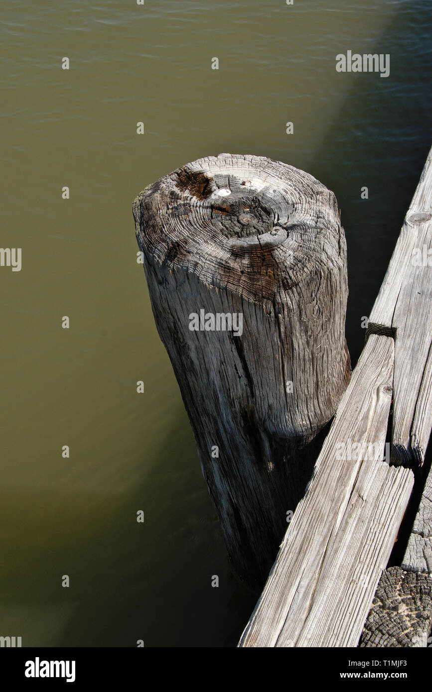 Wooden pier ocean inlet boat dock platform Stock Photo - Alamy