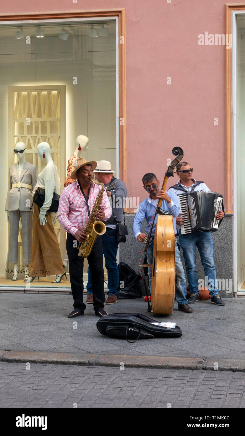 Money in a buskers hat hi-res stock photography and images - Alamy