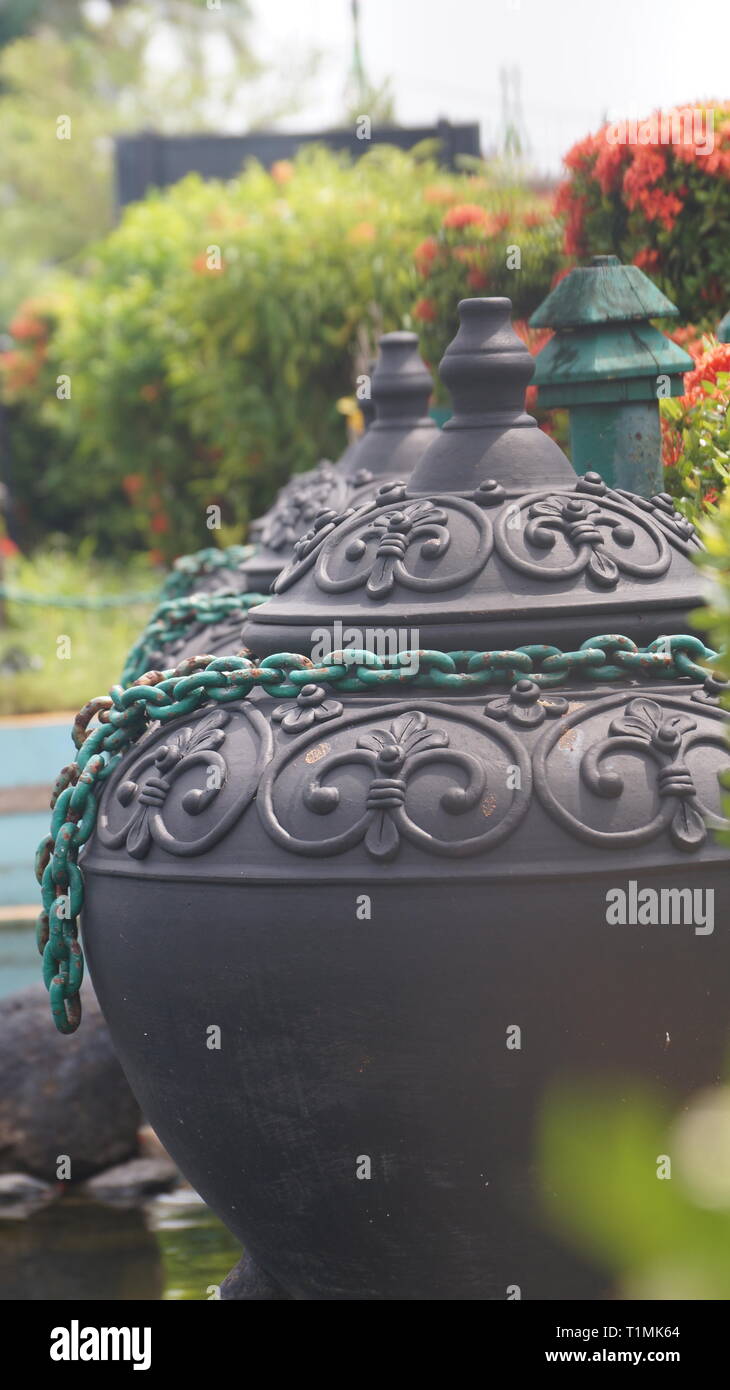 three jars with chain Stock Photo - Alamy