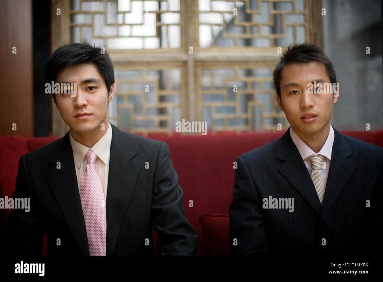 Two men sit table hi-res stock photography and images - Alamy
