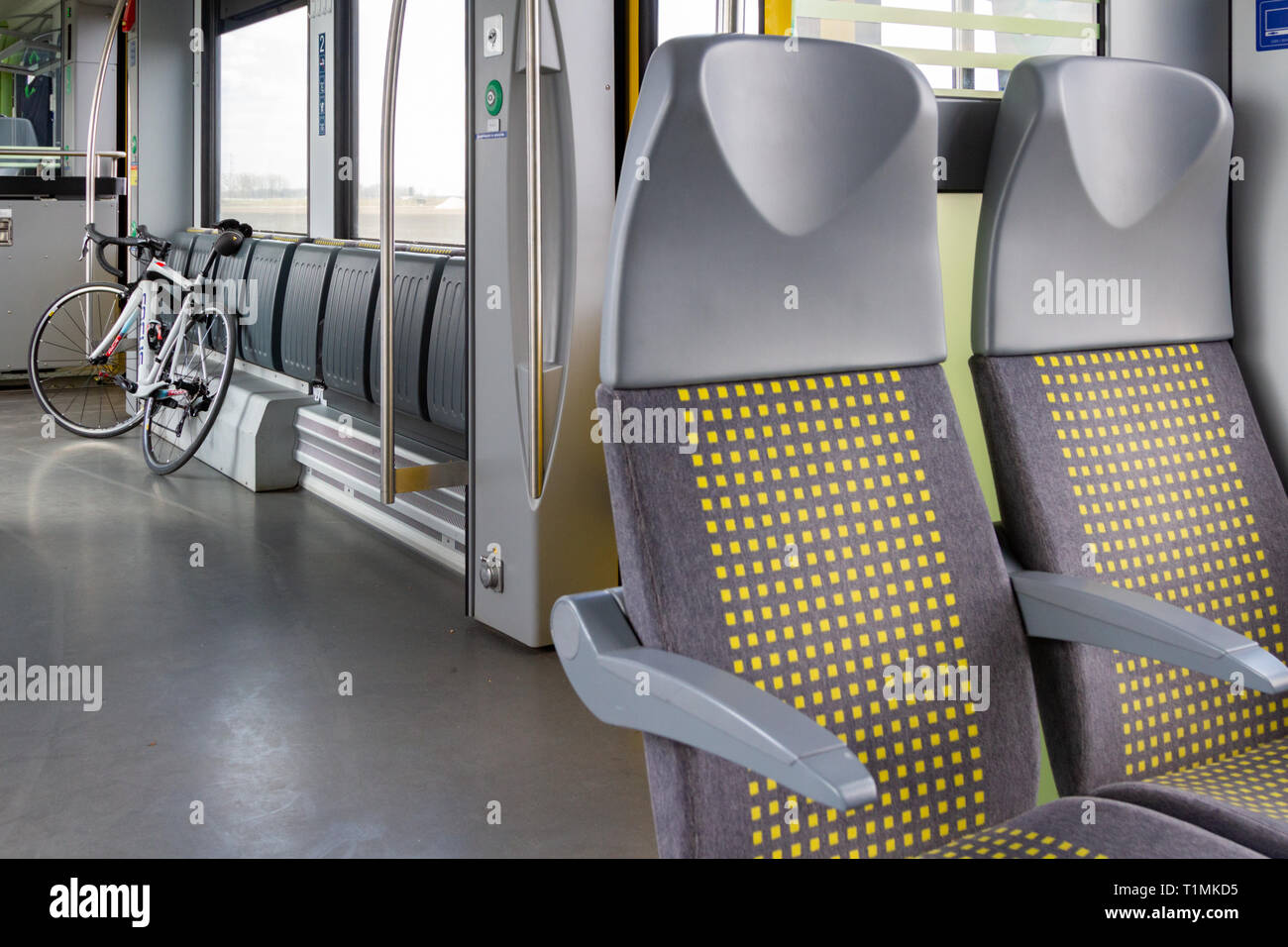 Passenger multiple-unit train interior carrying a bicycle in Hungary ...