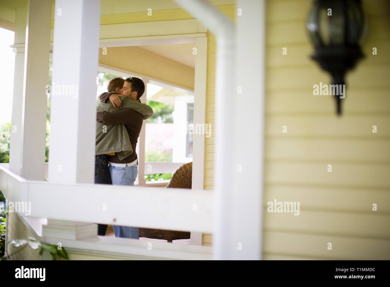 Two friends hugging Stock Photo - Alamy