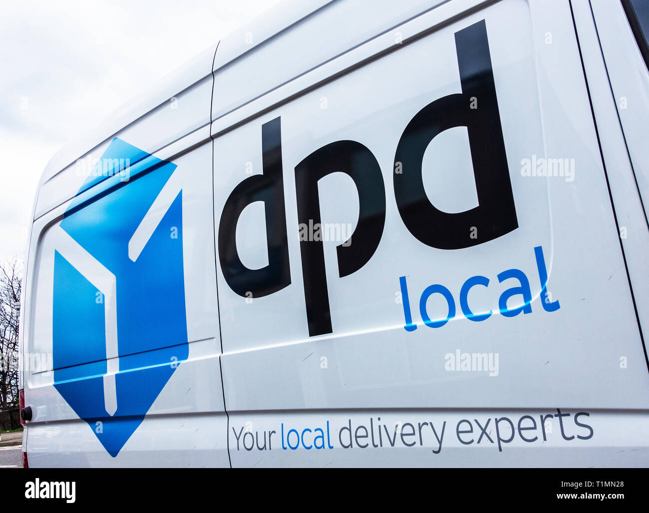 Closeup of company logo on a DPD local delivery van on deliveries Stock ...