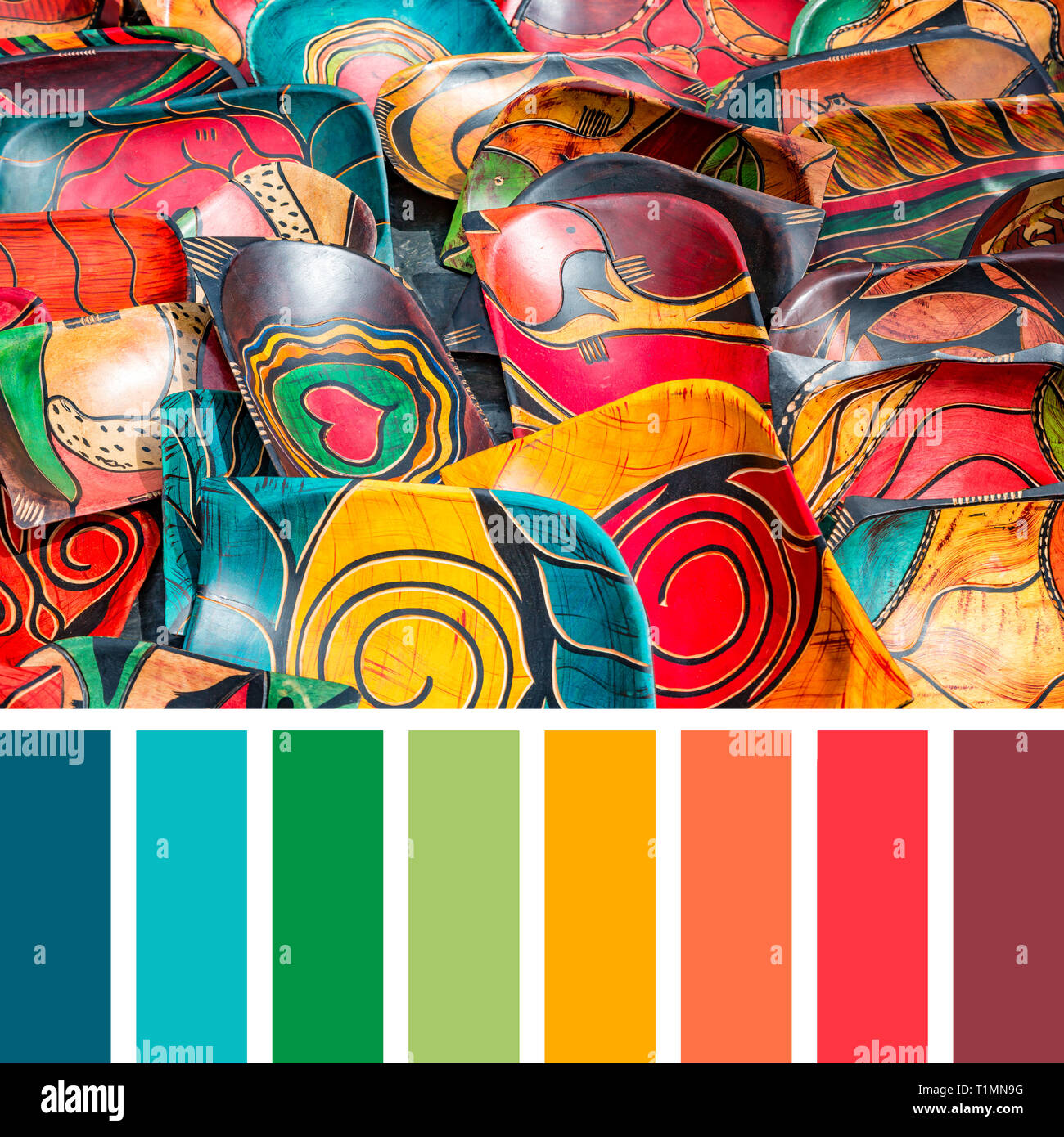 Decorative painted African carved wood bowls. In a colour palette with ...