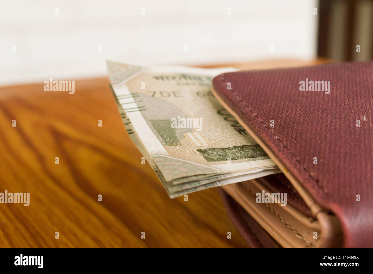 Indian five hundred (500) rupee cash note in brown color wallet leather ...