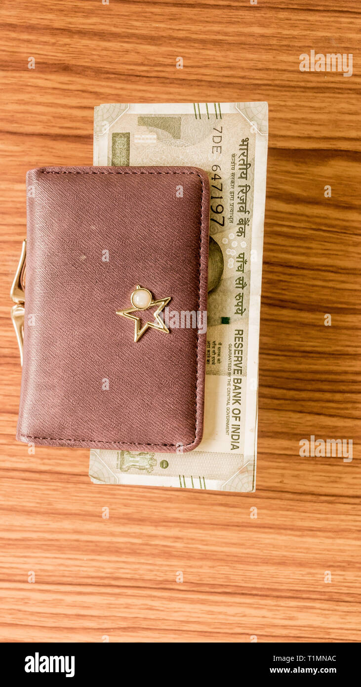 Indian five hundred (500) rupee cash note in brown color wallet leather ...