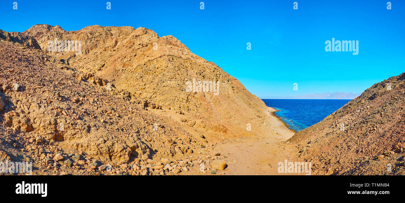 Enjoy the hike in desert mountains of Sinai with a view on the rocky ...