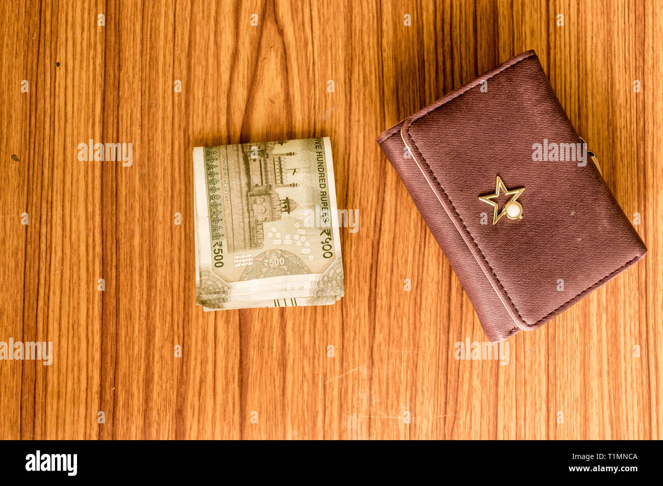 Indian five hundred (500) rupee cash note in brown color wallet leather ...