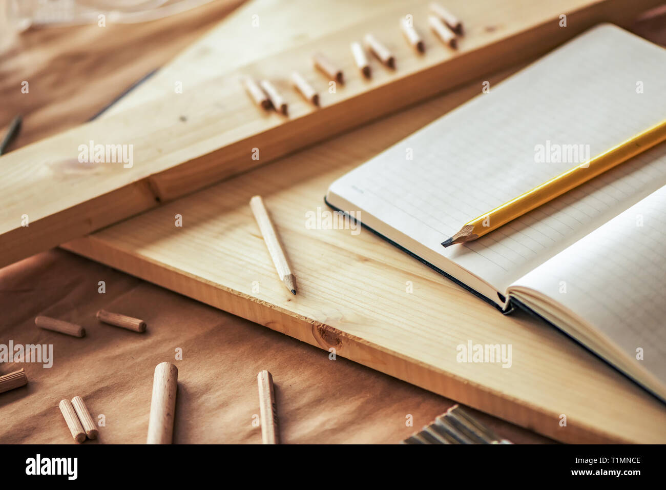 Carpentry project notes concept with pencil and notebook on workplace ...